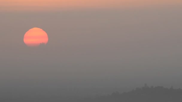 Sun rising through the haze — Stock Video © rickray #86203698
