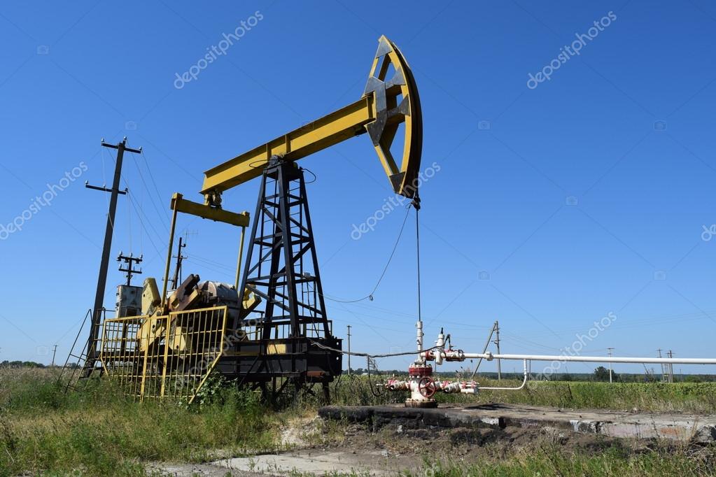 Pumping unit as the oil pump installed on a well — Stock Photo © Leonid ...