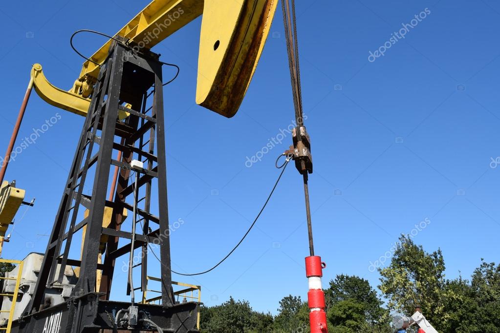 Pumping unit as the oil pump installed on a well — Stock Photo © Leonid ...