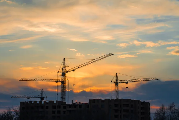 Construction cranes in sunset Stock Photo by ©olechowski 1736489