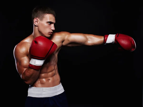 Young Boxer fighter over over black background — Stock Photo ...