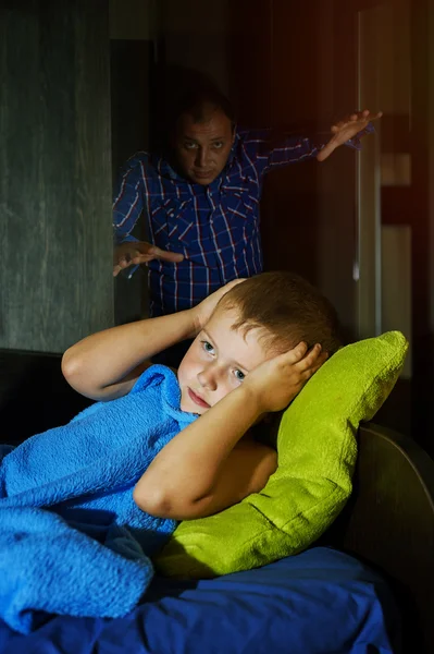 A scared little boy afraid in bed at night , childhood fears — Stock ...