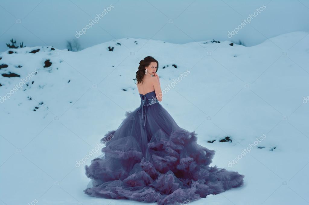 Beautiful model in the snow Stock Photo by ©mikola7771 101694916
