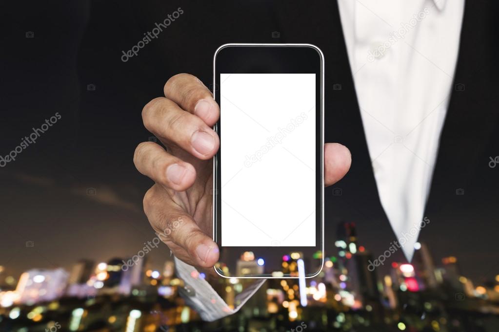 Businessman showing mobile phone with copy space on screen Stock Photo ...