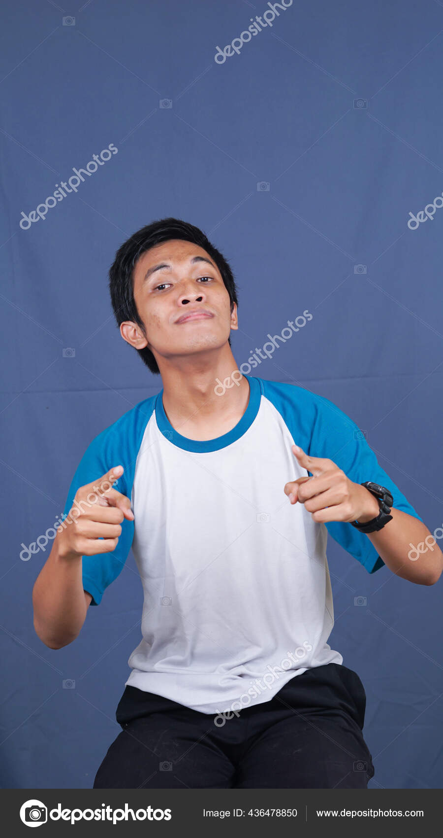 Asian Man Pointing Camera — Stock Photo © humbaframe.gmail.com #436478850
