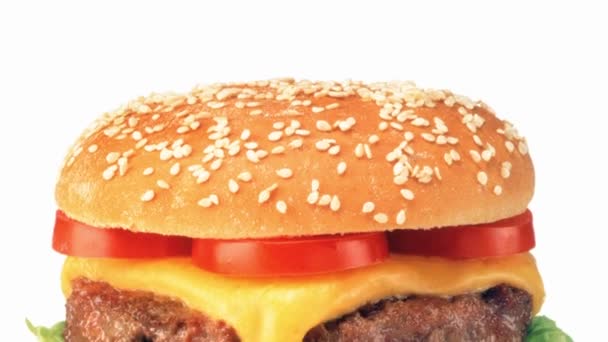 Rotating cheeseburger close up — Stock Video © StockFoodGmbH #69421277