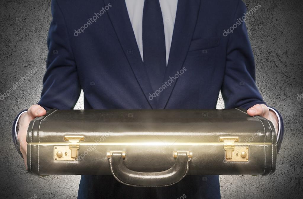 Worker with closed suitcase — Stock Photo © frenky362 #67796331