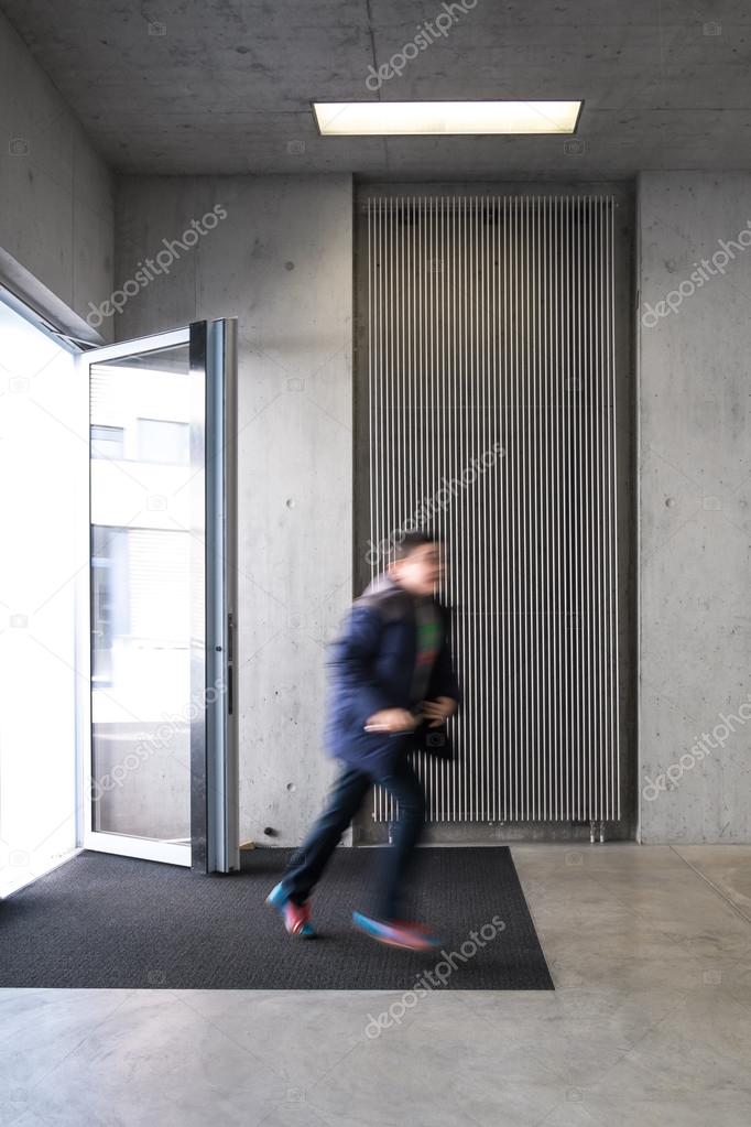 Boy running in the interior of the new building Stock Photo by ©marvlc ...