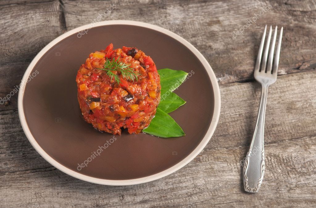Vegetable stew in a brown plate — Stock Photo © KucherAndrey #105182492