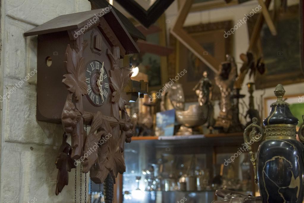 Wooden cuckoo clock in an antique shop Stock Photo by ©Ciberdan 67114721