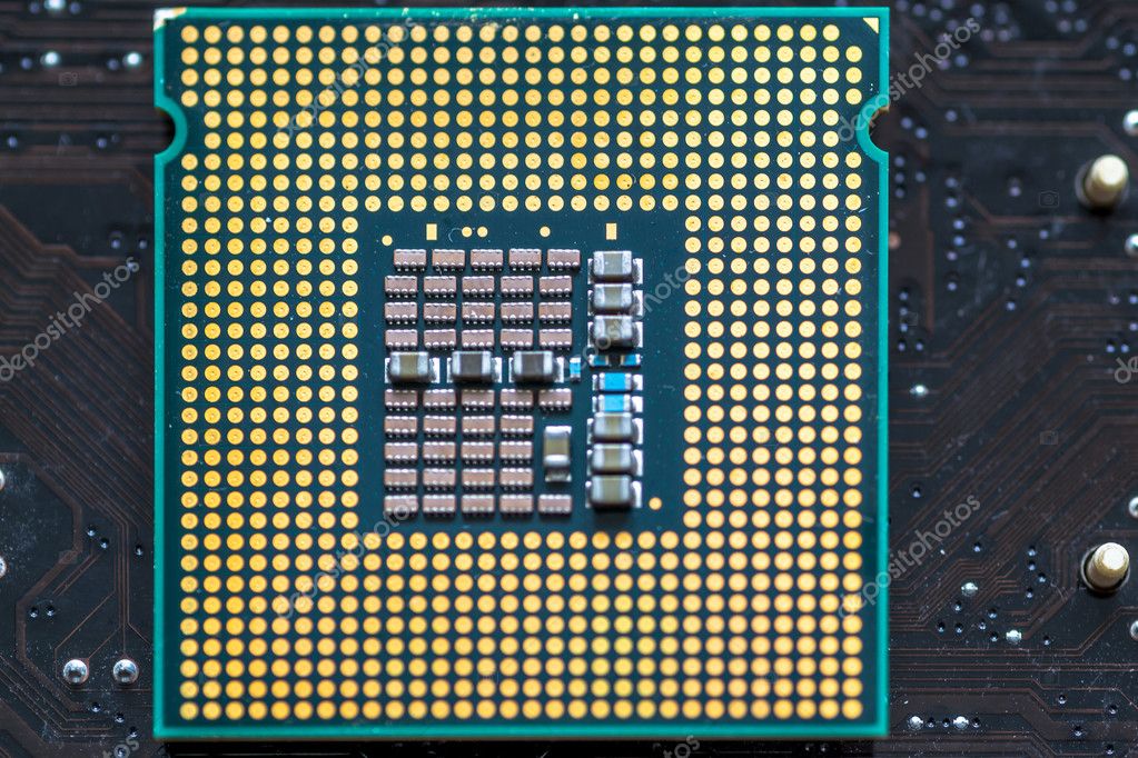 Closeup Macro of a Computer CPU Processing Chip — Stock Photo © johndwilliamsUK #84085888
