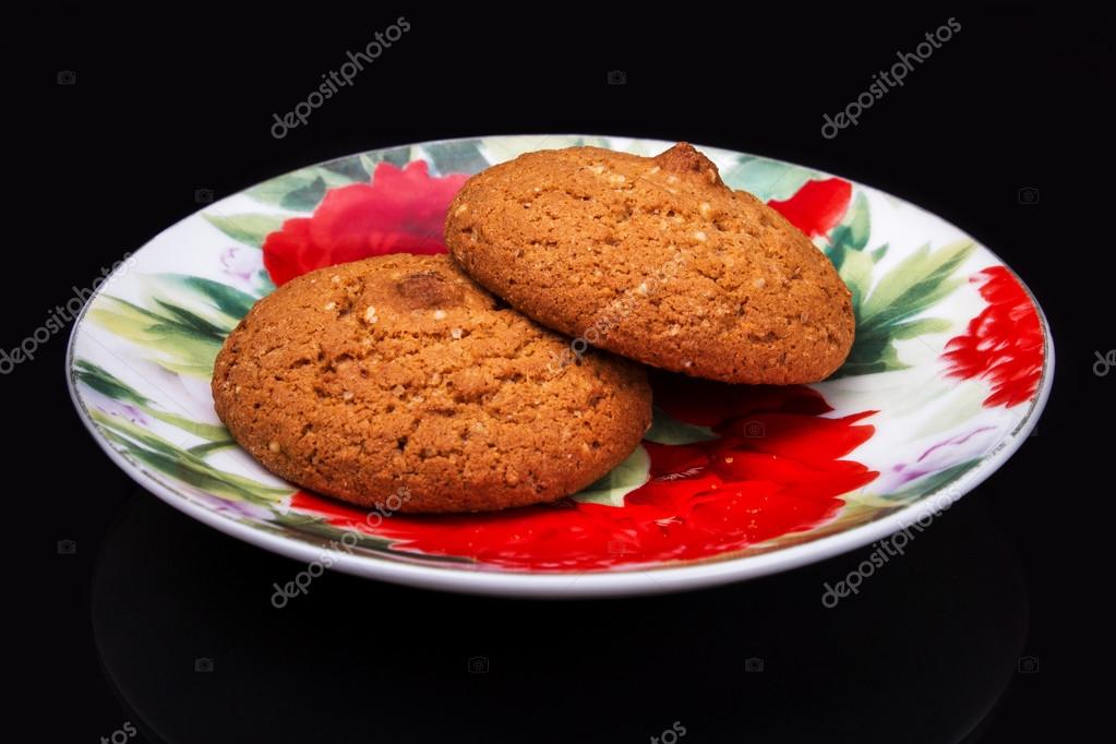 Hot oatmeal on a black background with reflection Stock Photo by ...