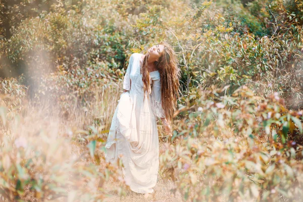 Sensual boho woman in white dress outdoors Stock Photo by ...