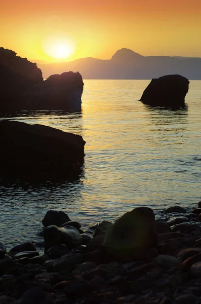 Peaceful sunset or sunrise on the seashore landscape in calm and quiet ...