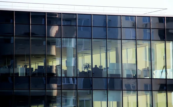 Windows of business centre building with offices inside - Stock Image ...