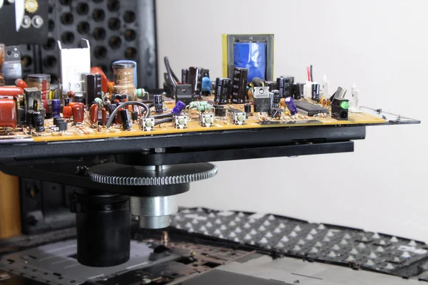 Electronic board with radio components at electronics plant conveyor ...