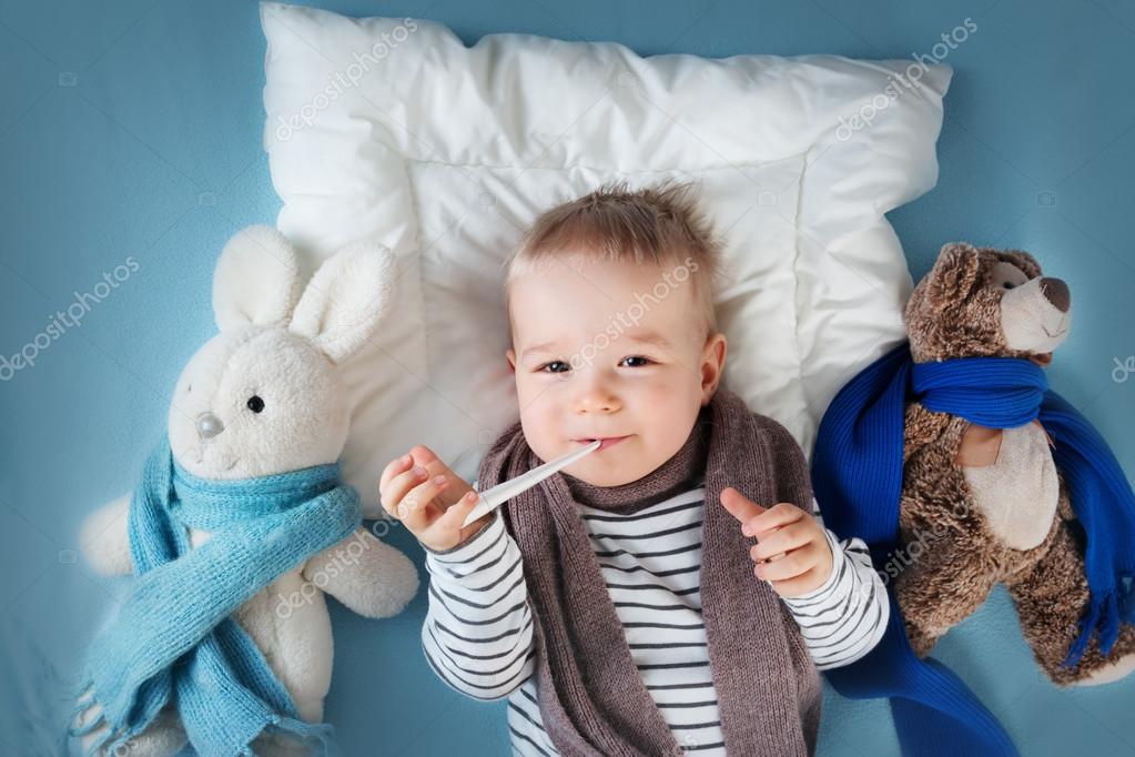 Ill boy lying in bed — Stock Photo © candy18 #101629350