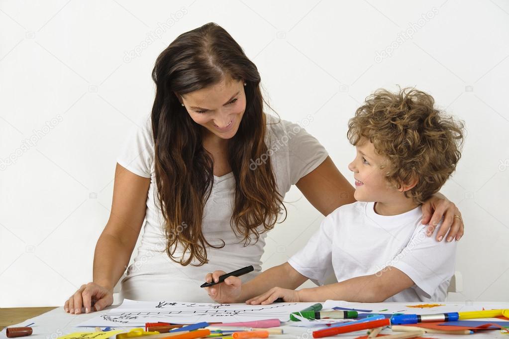 Learning to draw with mother Stock Photo by ©brendel 68274767