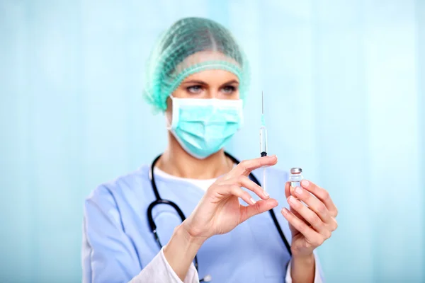 Nurse preparing an injection of botox Stock Photo by ©Nikodash 69439319