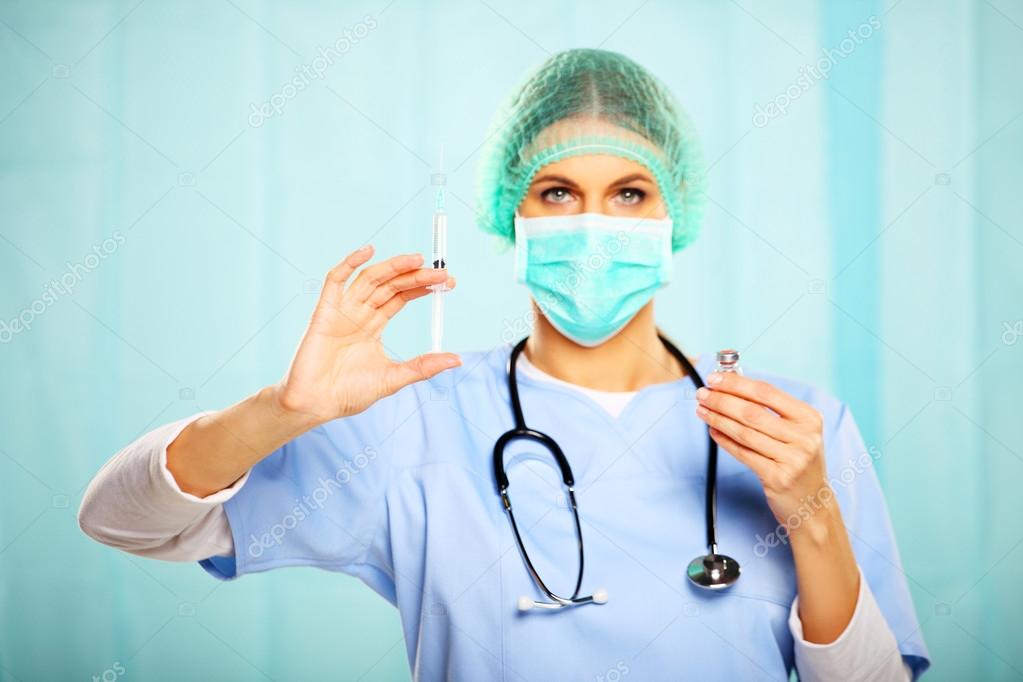 Nurse preparing an injection of botox Stock Photo by ©Nikodash 69439487