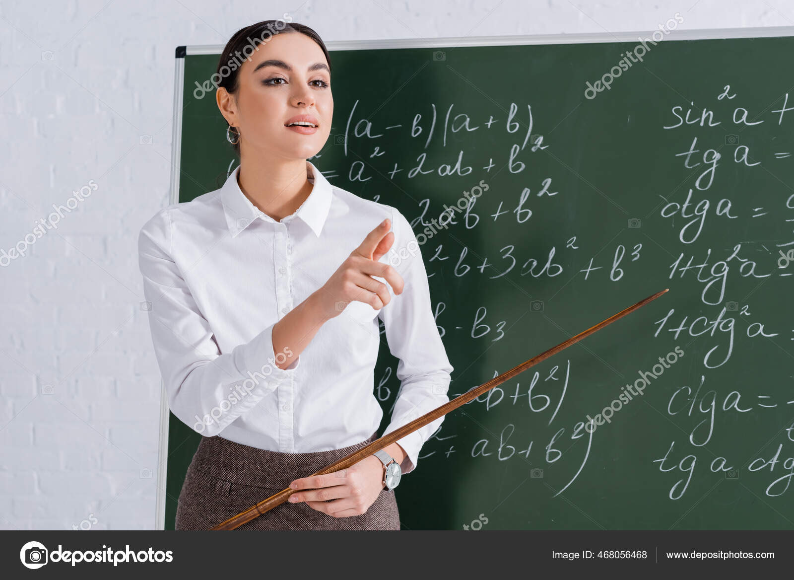 Young Teacher Pointer Pointing Away Chalkboard Stock Photo by ...