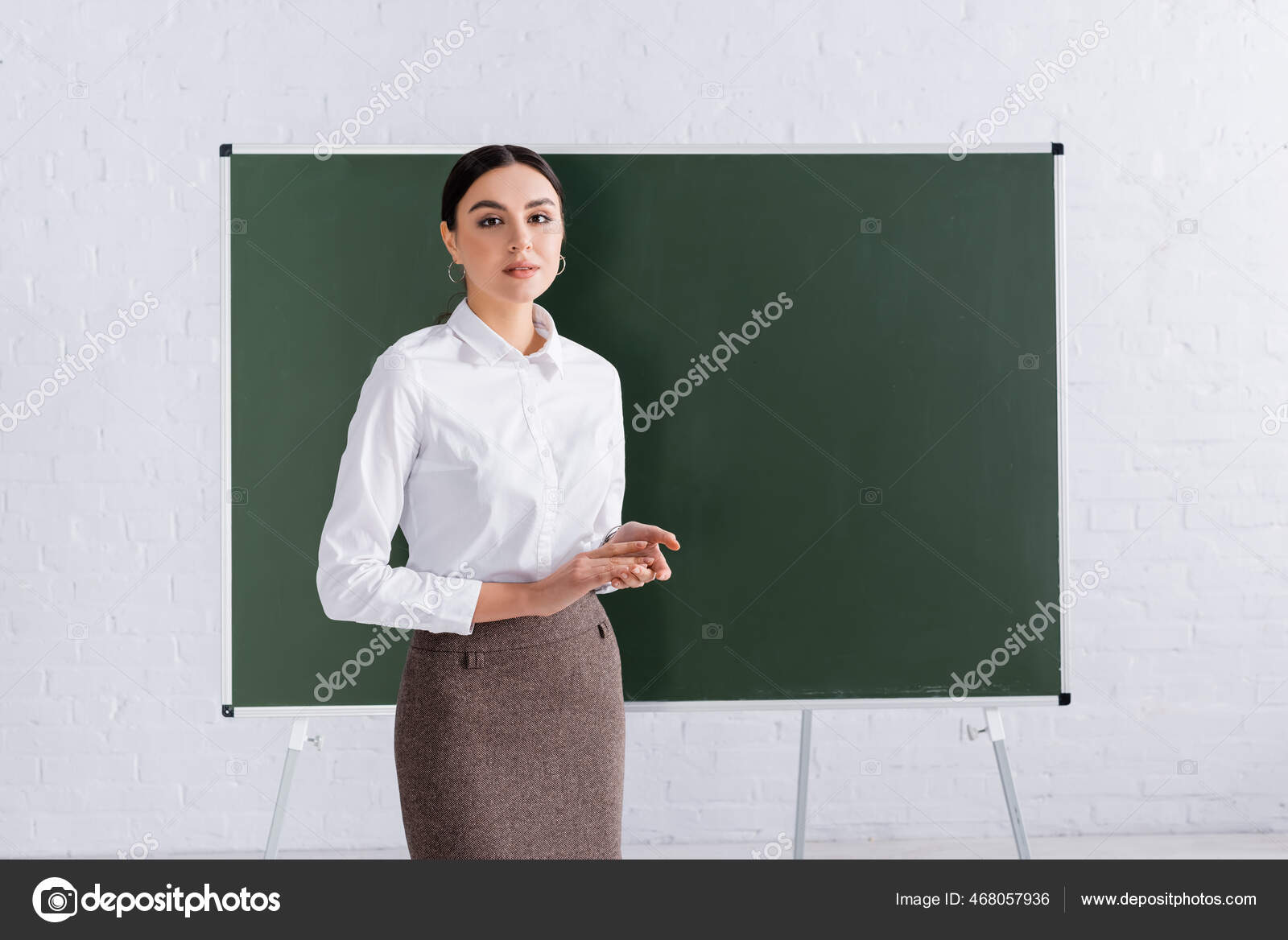 Teacher Standing Chalkboard Classroom Stock Photo by ©Ischukigor 468057936