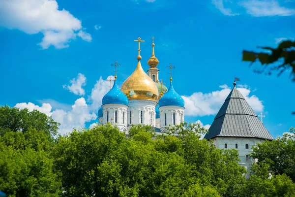 Novospassky Monastery with Golden dome on the blue sky background ...
