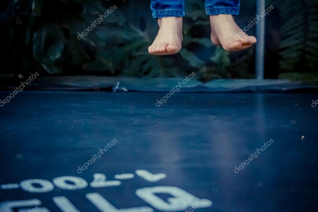 Legs floating in the air after jumping on the trampoline — Stock Photo ...
