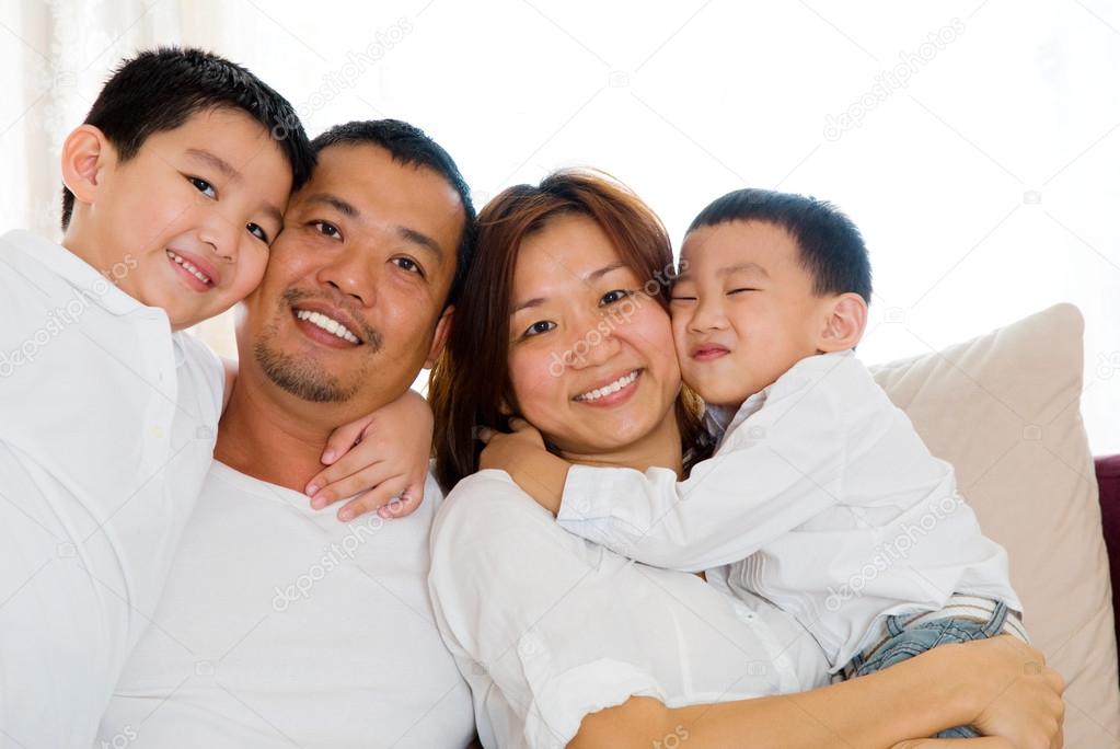 Asian family Stock Photo by ©szeyuen 79431158