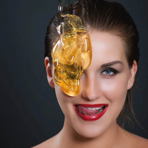 Concept sugaring epilation skin care with liquid sugar near face ... Concept sugaring epilation skin care with liquid sugar near face ...