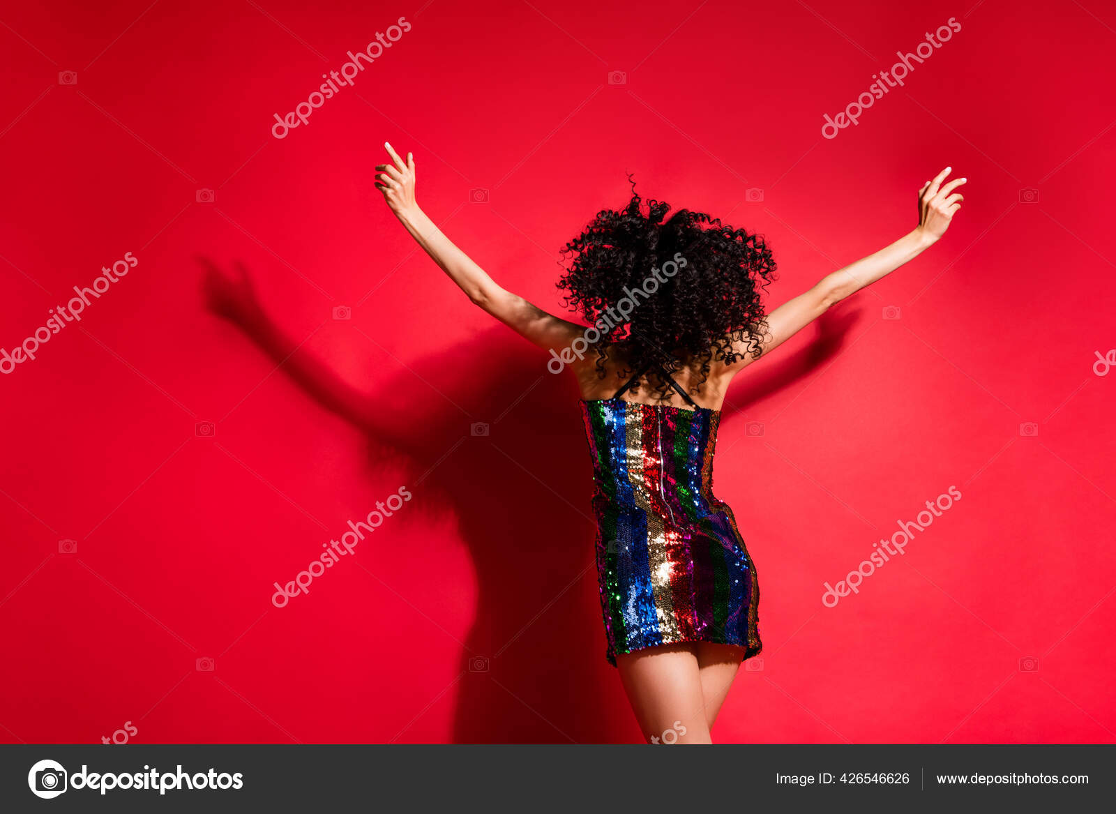 Rear back behind view of her stunning slender wavy-haired girl having ...