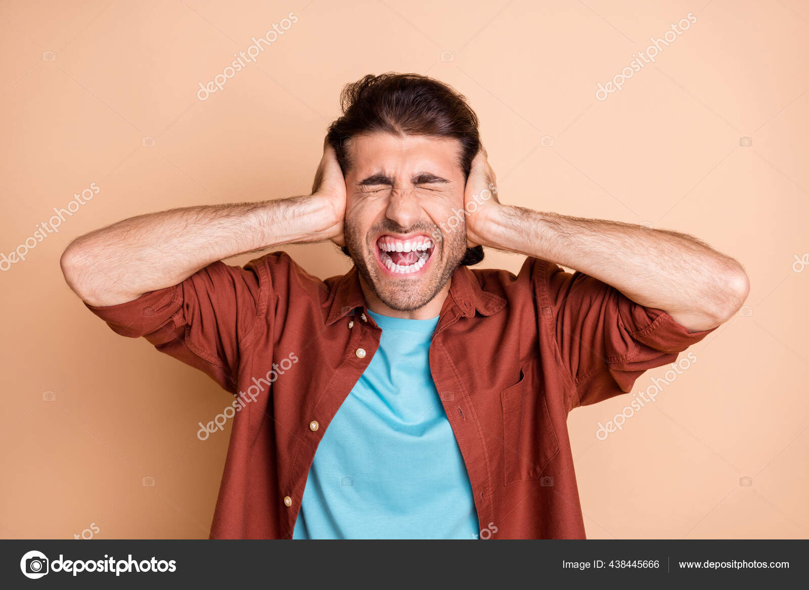 Close-up portrait of nice mad fury outraged guy closing ears terrible ...