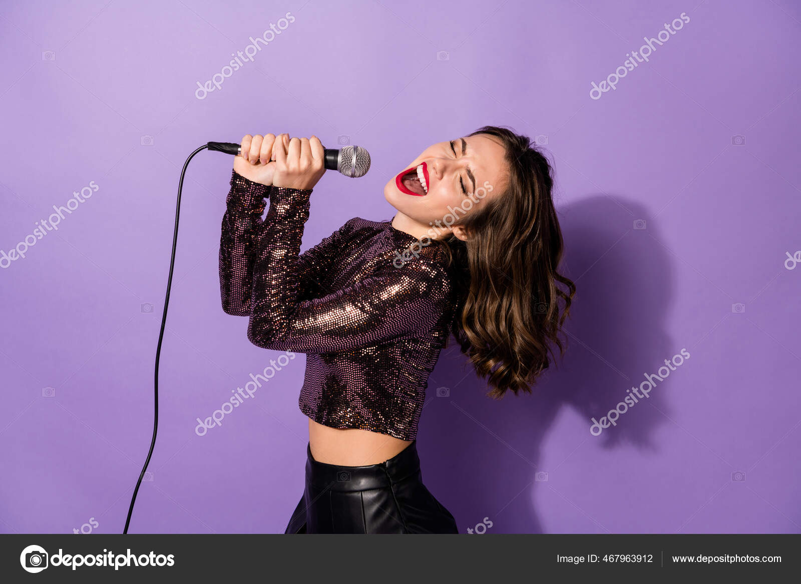 Portrait of charming glamorous talented girl singing modern single hit ...