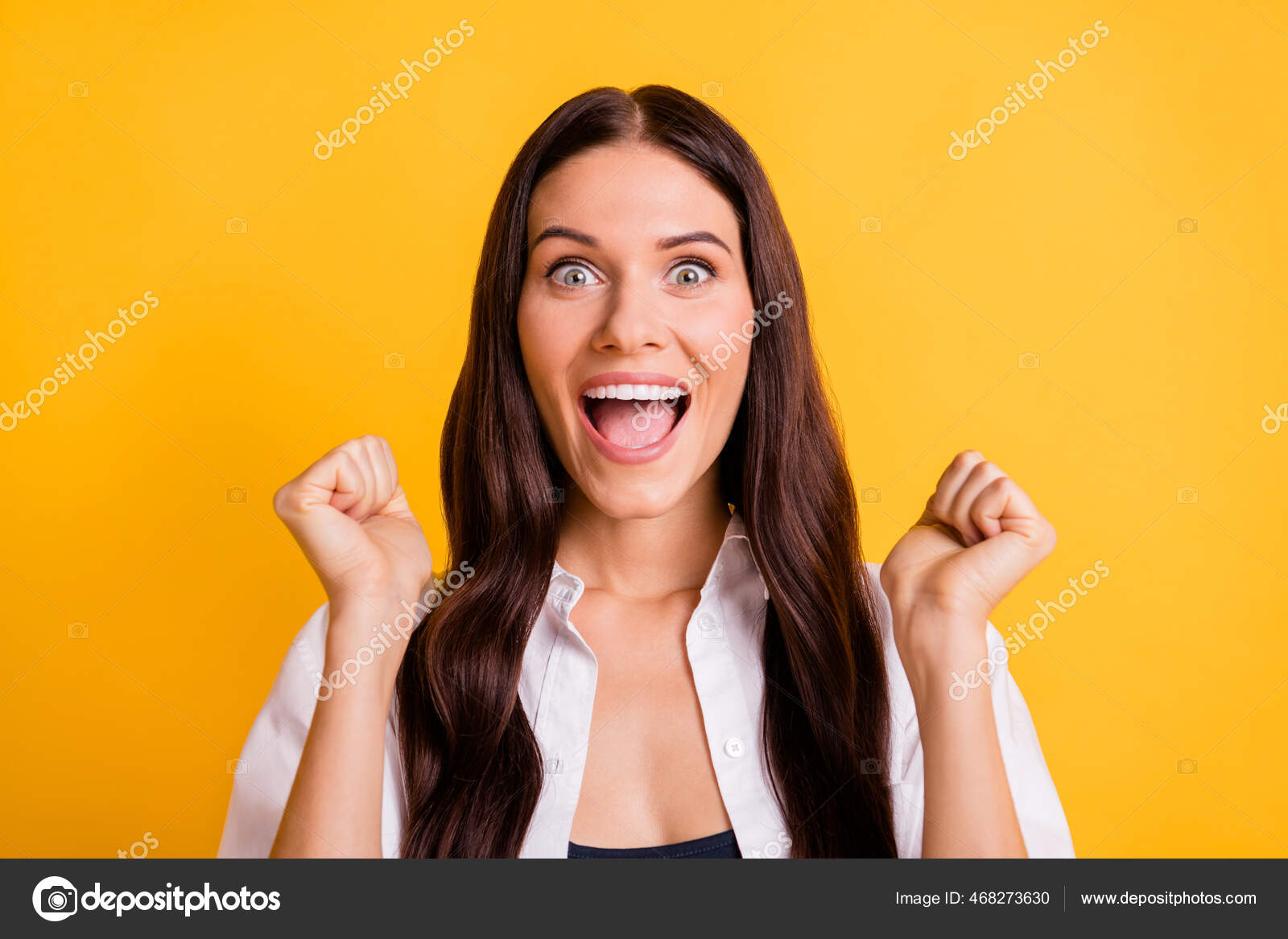 Photo Of Astonished Pretty Lady Fists Up Open Mouth Shout Yes Celebrate