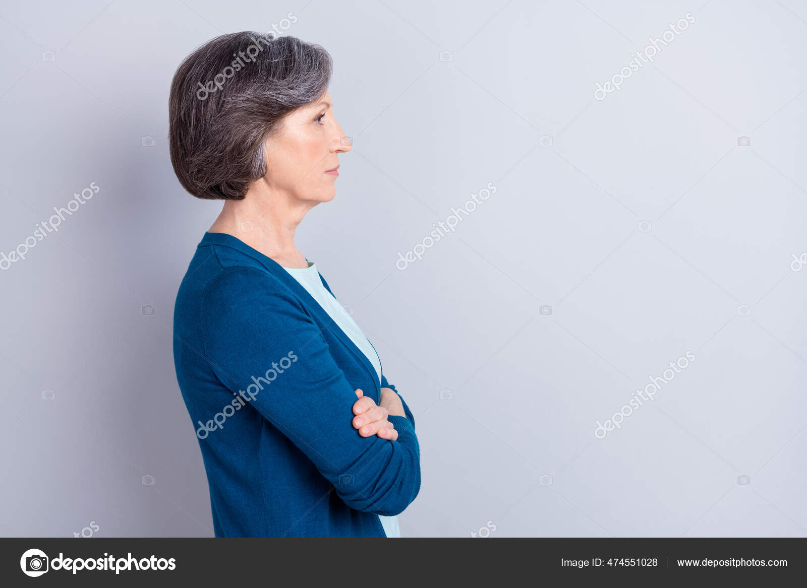 Photo of serious pretty mature lady dressed blue outfit hands crossed ...