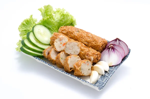 Ngor Hiang o pasta de pescado con ajo, cebolla, pepino en rodajas y 2024