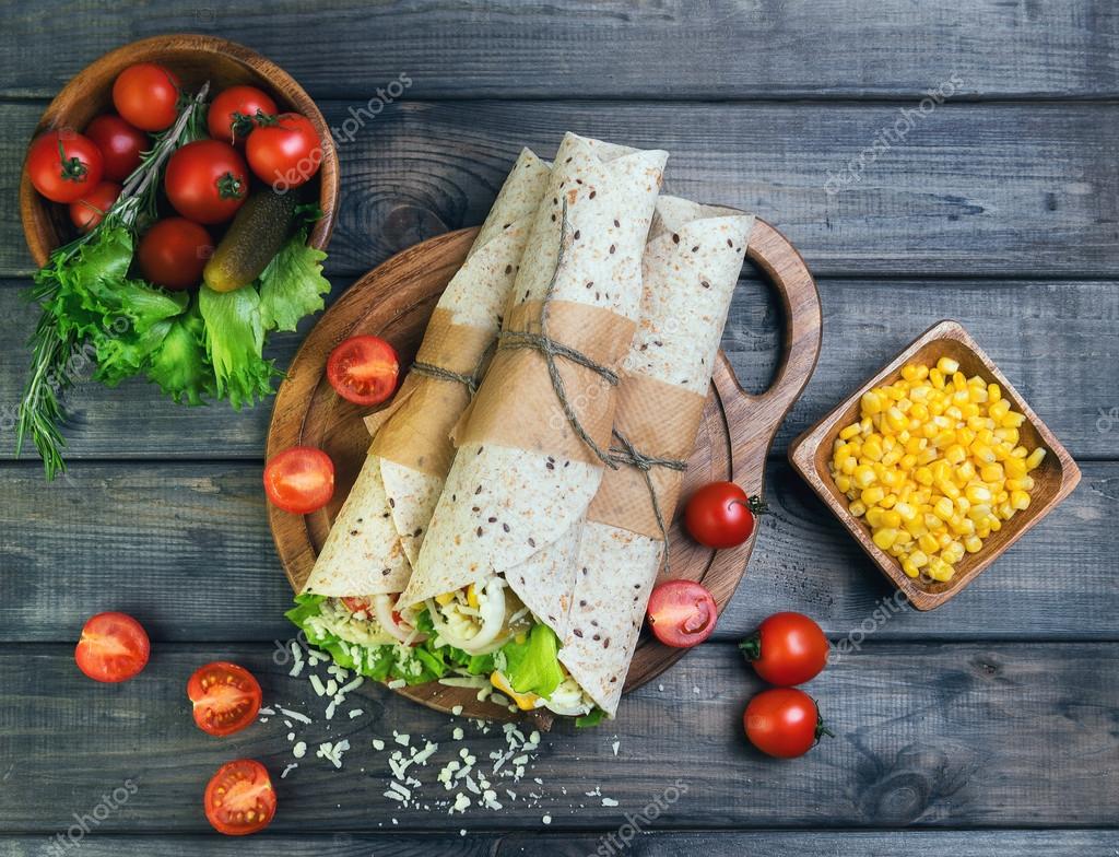 Sandwiches twisted roll Tortilla Stock Photo by ©FSerega 100044998