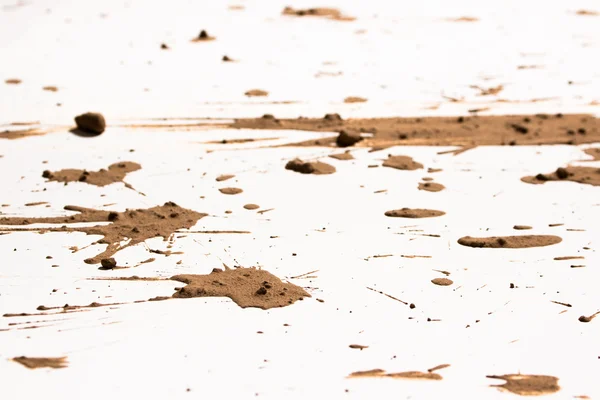 Splash of clay on white — Stock Photo © diogoppr #69748061