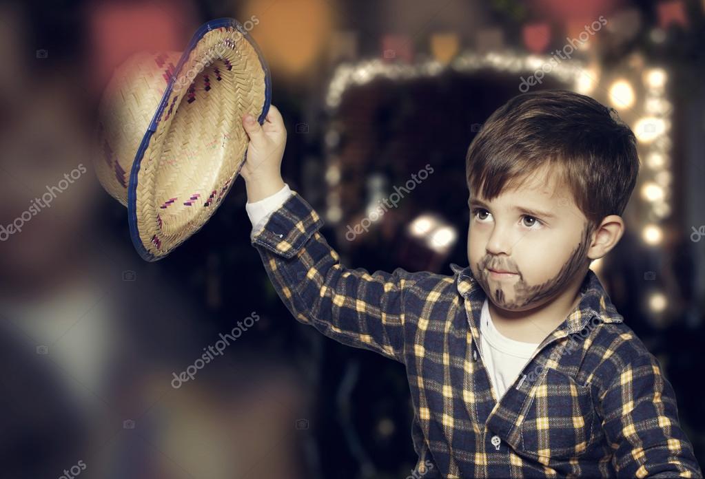 Boy with painted beard and a hat — Stock Photo © diogoppr #69752583