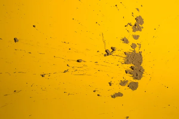 Splash of clay on orange - Stock Image - Everypixel