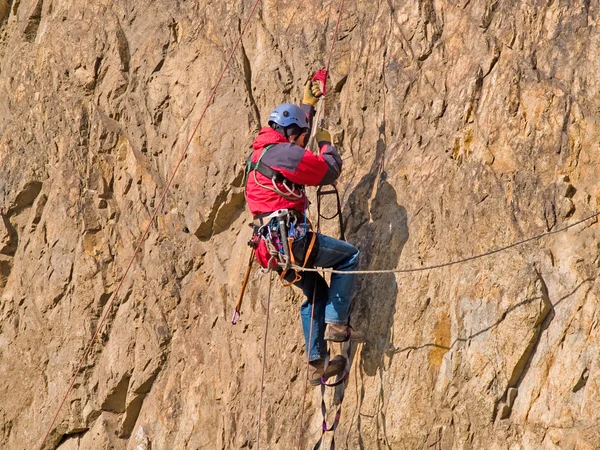 Rock climber at ladder - Stock Image - Everypixel