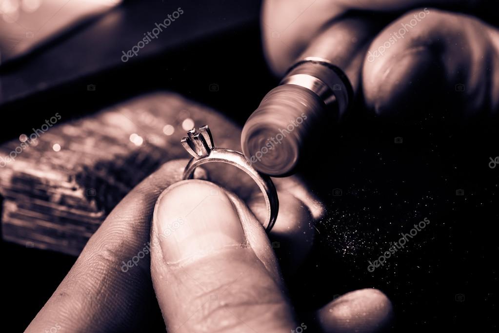 Man polishing Ring. Stock Photo by ©forkjemper 70562307