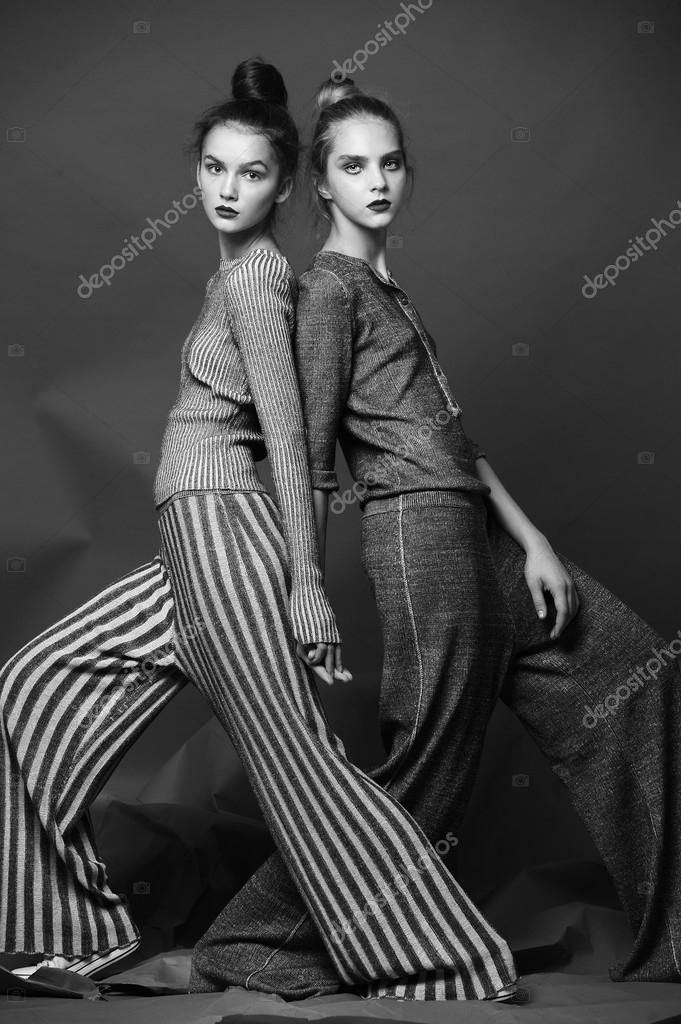 Fashion model pose on light background Stock Photo by ©Rattleray 71655943