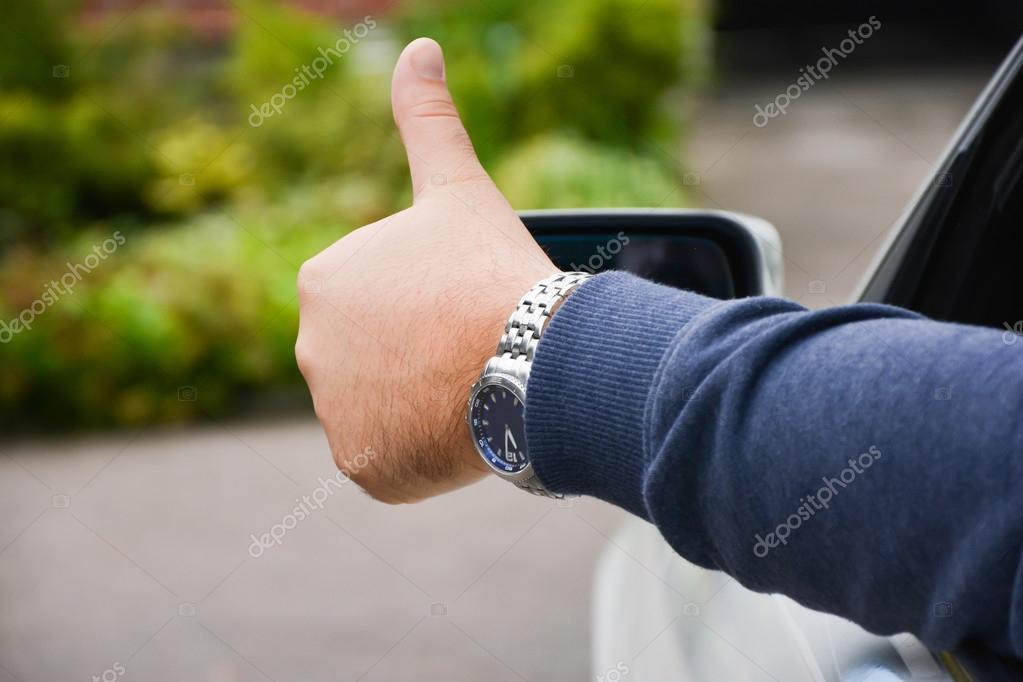 Hand sign OK from a car window Stock Photo by ©NewNow 71603495