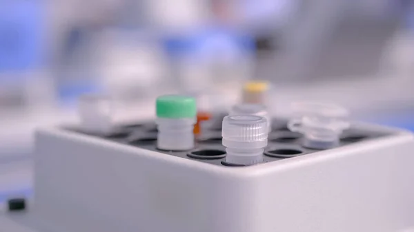 Plate shaker for mixing biological samples in vials at factory ...