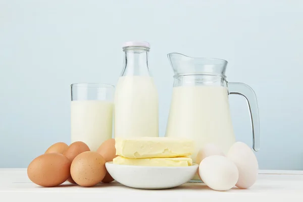 Dairy products. Assortment of fresh milk on white table with col ...