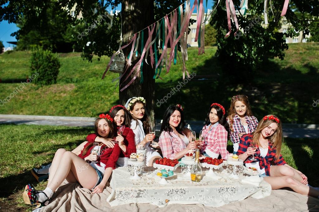 Picnic Table Costumes Seven Happy And Sexy Girls Sitting At Picnic