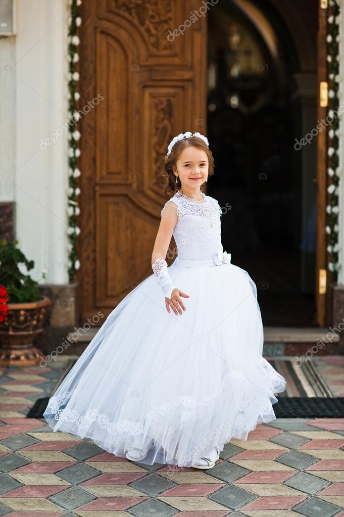 Two Pretty Little Girls In White Dresses Stock Photo