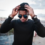 Young handsome afro black man Stock Photo by ©peus 90303780