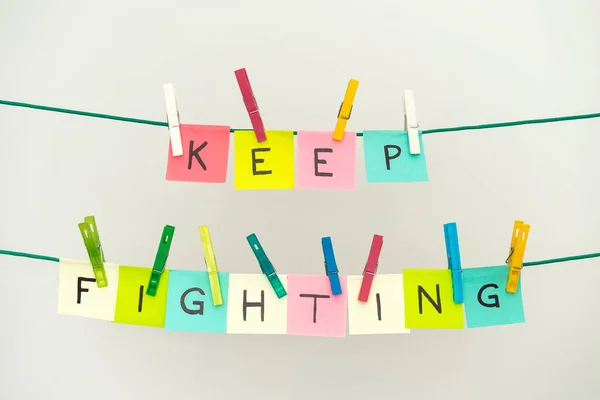 COLOR STICKY NOTES WITH LETTERS ON THE CLOTHES LINE SPELLING KEEP ...